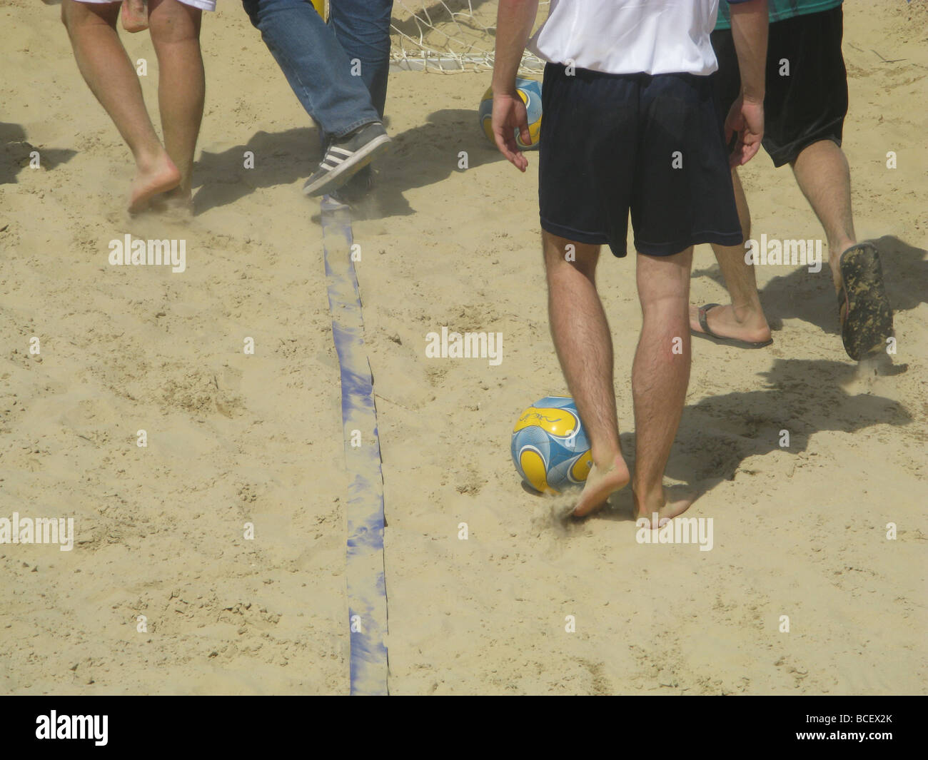 players entering pitch at a beach soccer tournament Stock Photo - Alamy