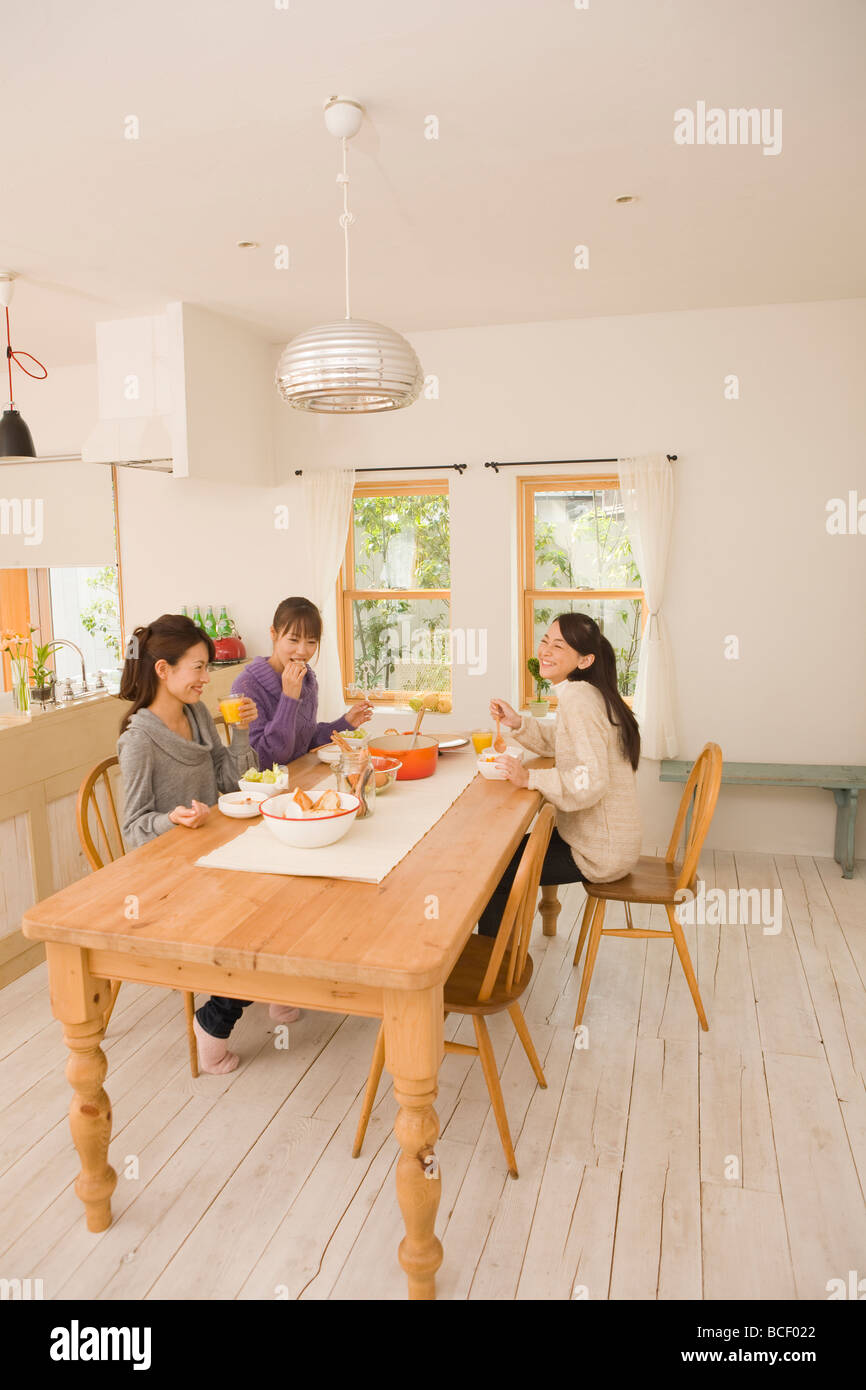 Young women having home party Stock Photo - Alamy