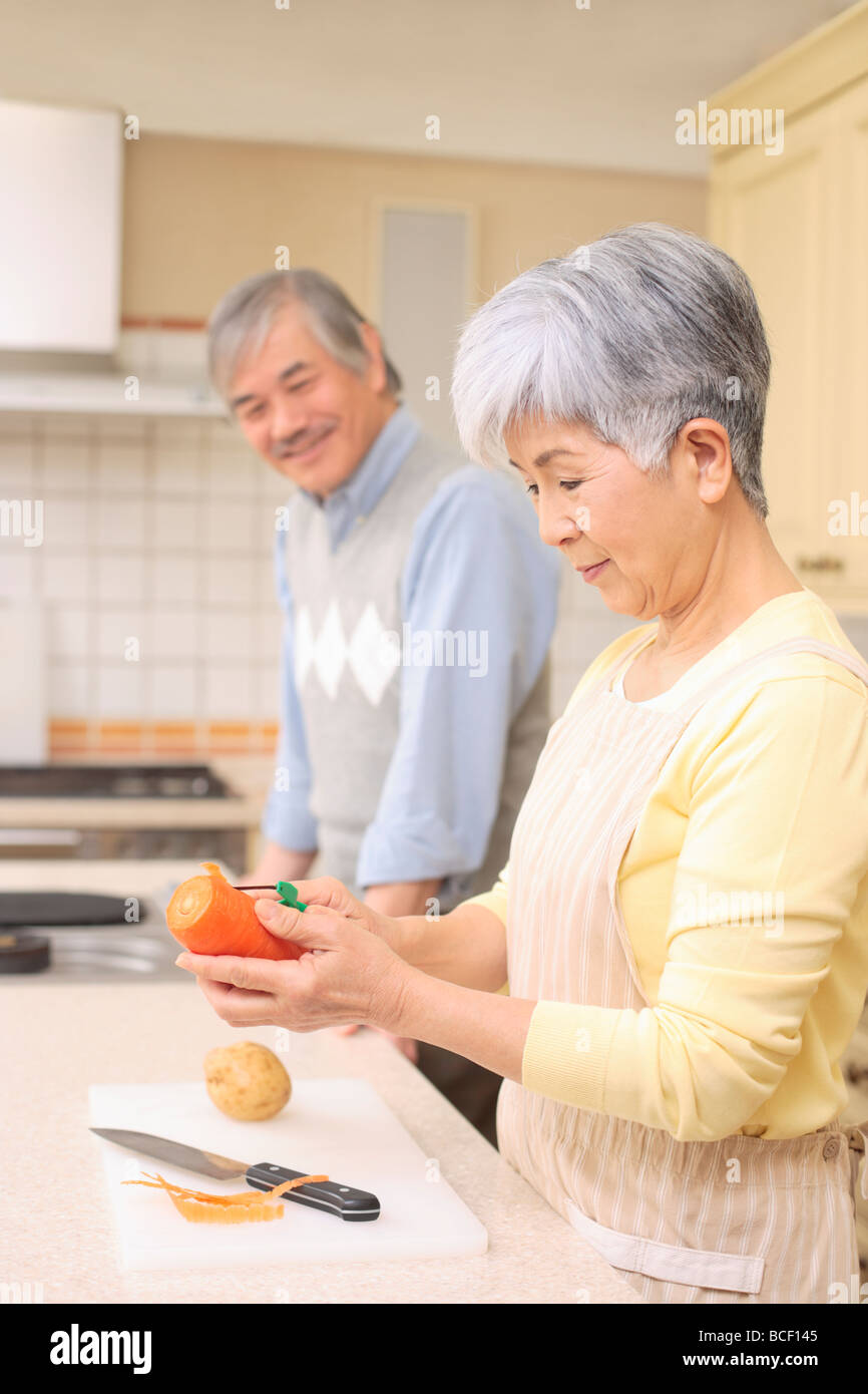 Senior couple cooking Stock Photo - Alamy