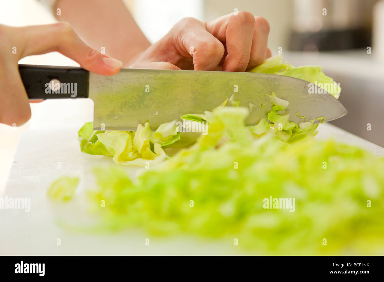 Human Hand cooking Stock Photo - Alamy