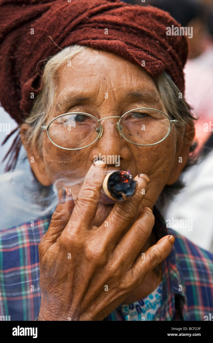 Woman smoking a cheroot cigar hi-res stock photography and images - Alamy