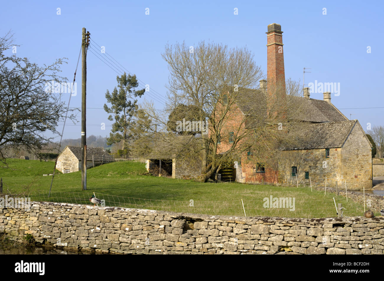 The Old Water Mill, Lower Slaughter, Gloucestershire, England Stock ...