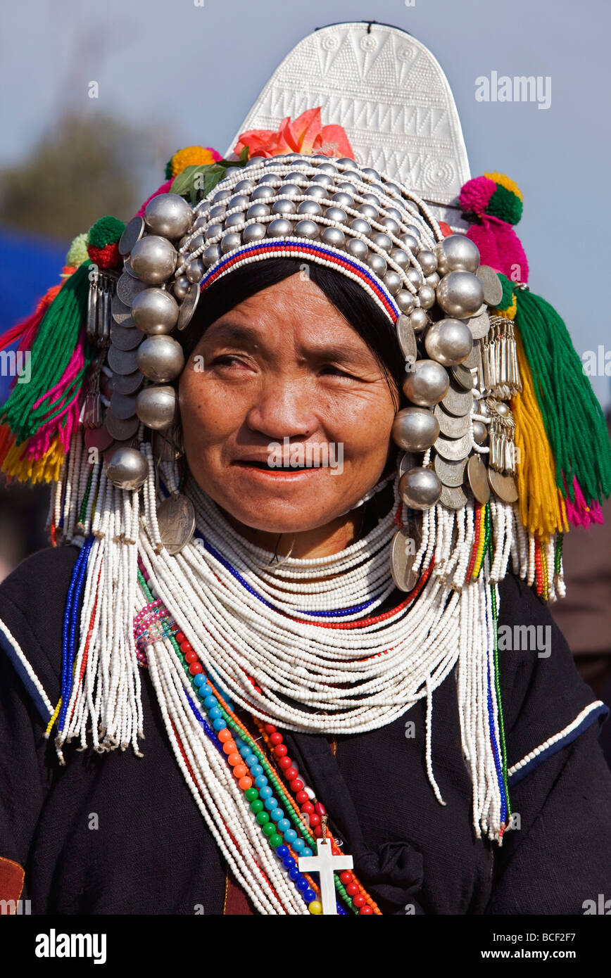 Myanmar, Burma, Kengtung. An Akha woman wearing a traditional headdress ...