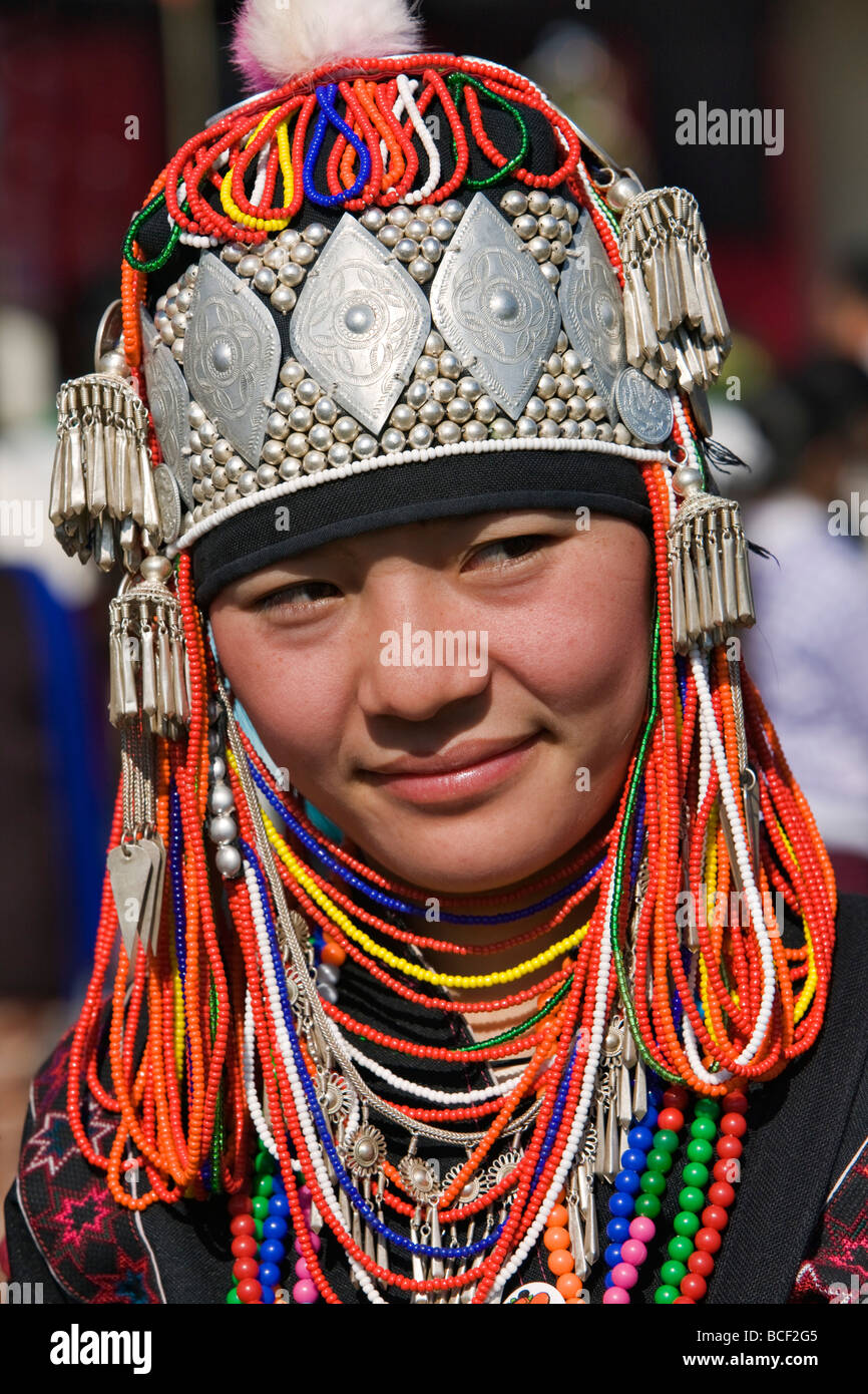 Myanmar, Burma, Kengtung. An Akha woman wearing traditional costume ...