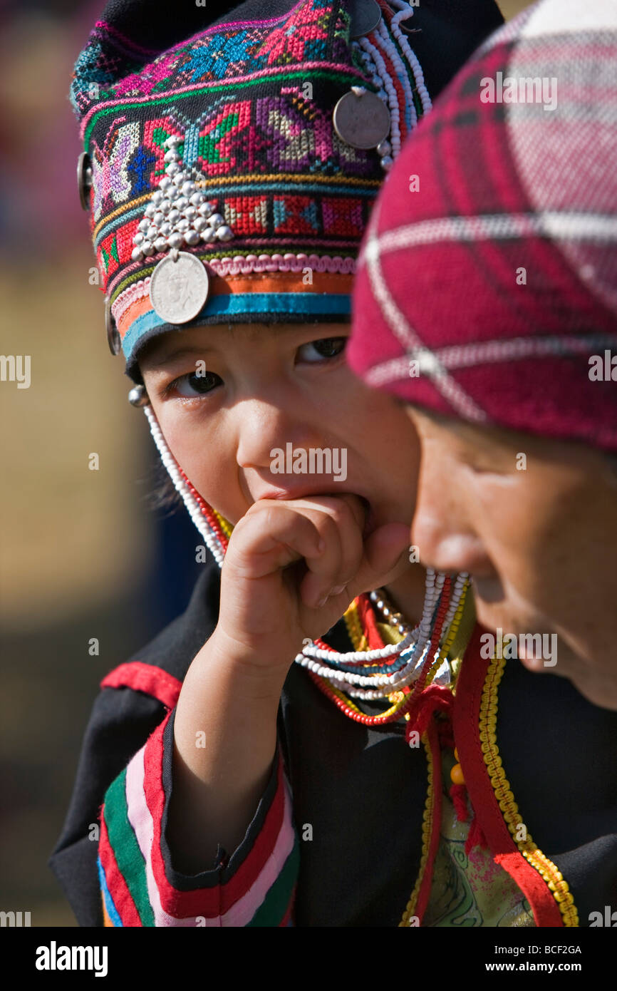 Myanmar, Burma, Kengtung. A young Akha boy wearing a colourful ...