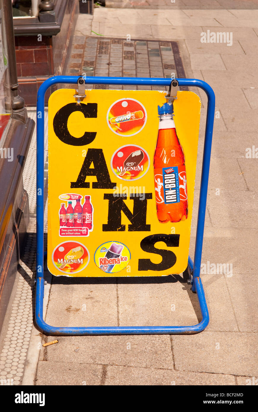 A sign outside a Uk shop store advertising cold drinks and ice creams ...