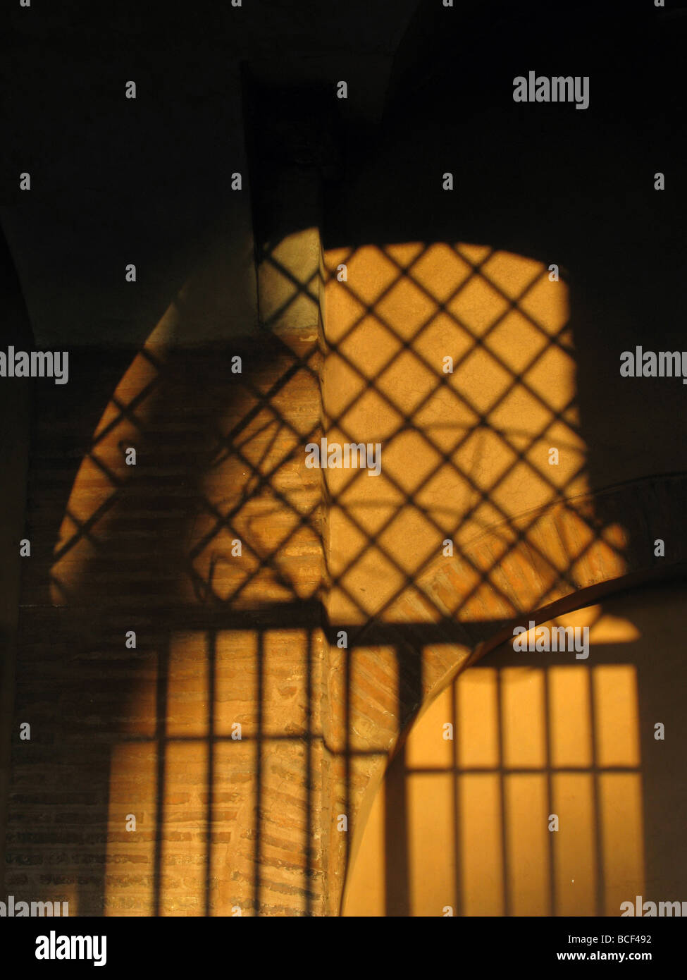 metal bars grill shadow detail on church wall in rome italy Stock Photo ...