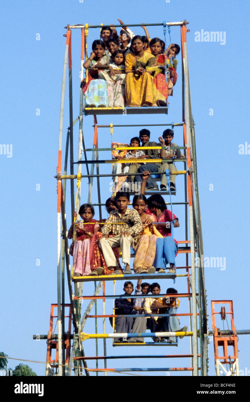 Indian merry go round boys hi-res stock photography and images - Alamy