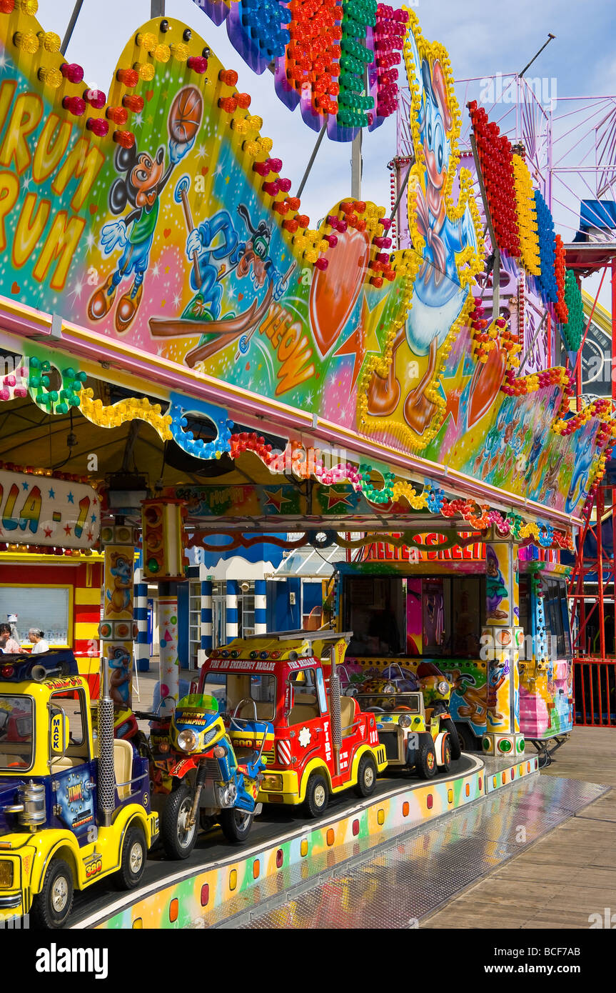 Colourful childrens kids fairground ride on Blackpool pier Lancashire ...