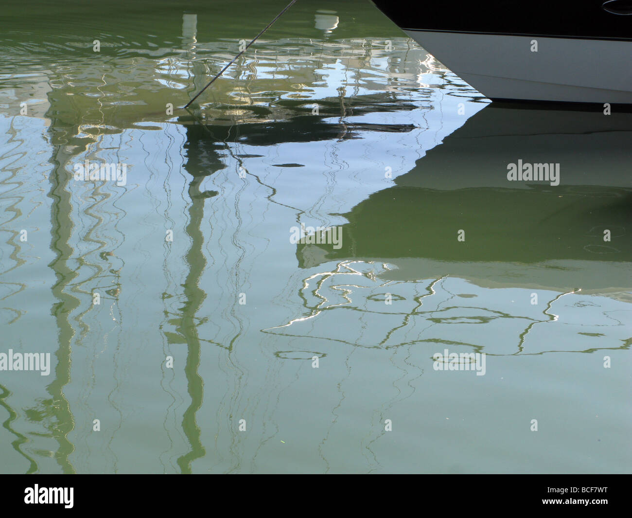 abstract reflection of boats in water in sea Stock Photo - Alamy
