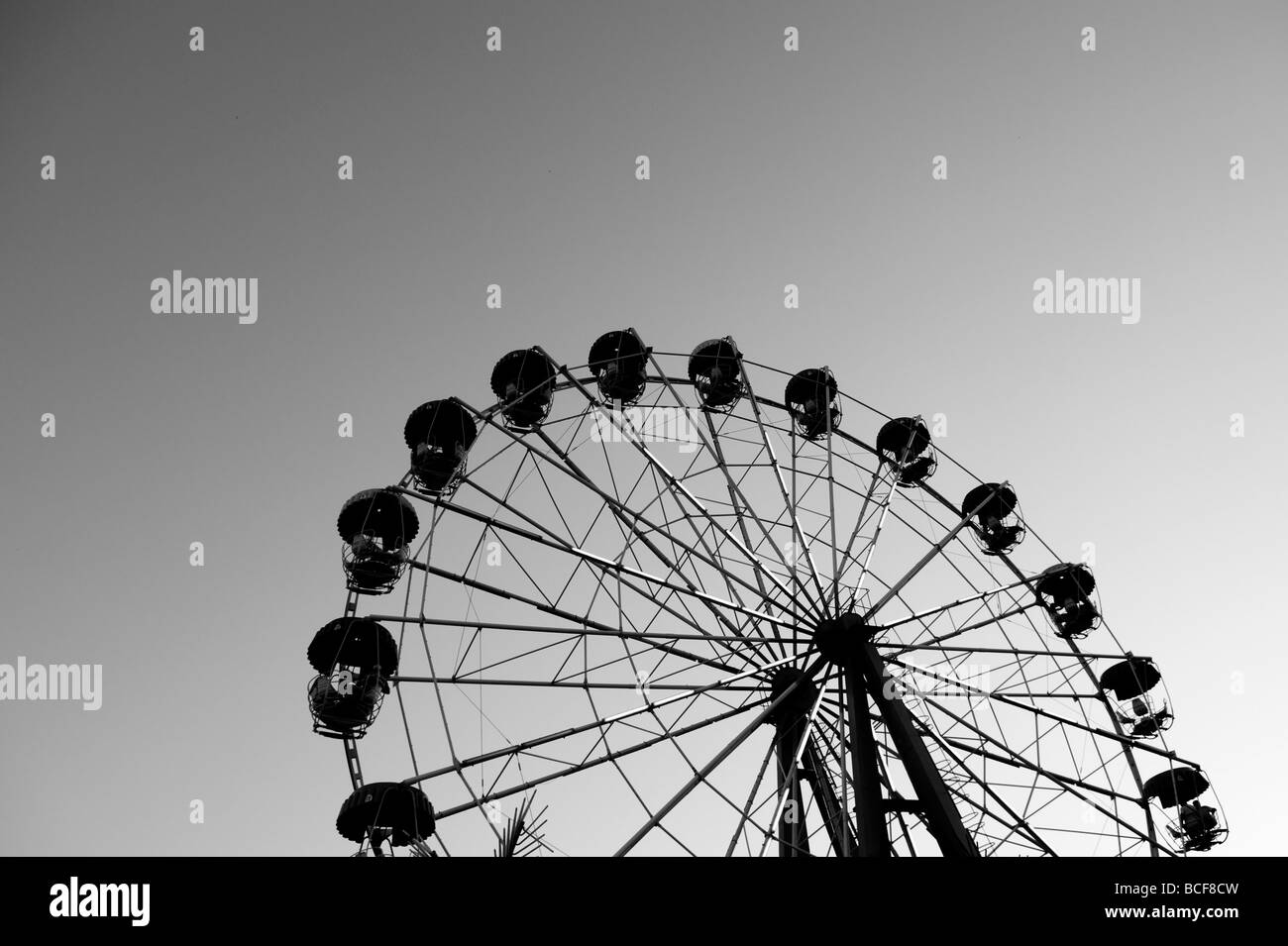 Carnival ferris wheel in Black and White Stock Photos & Images - Alamy