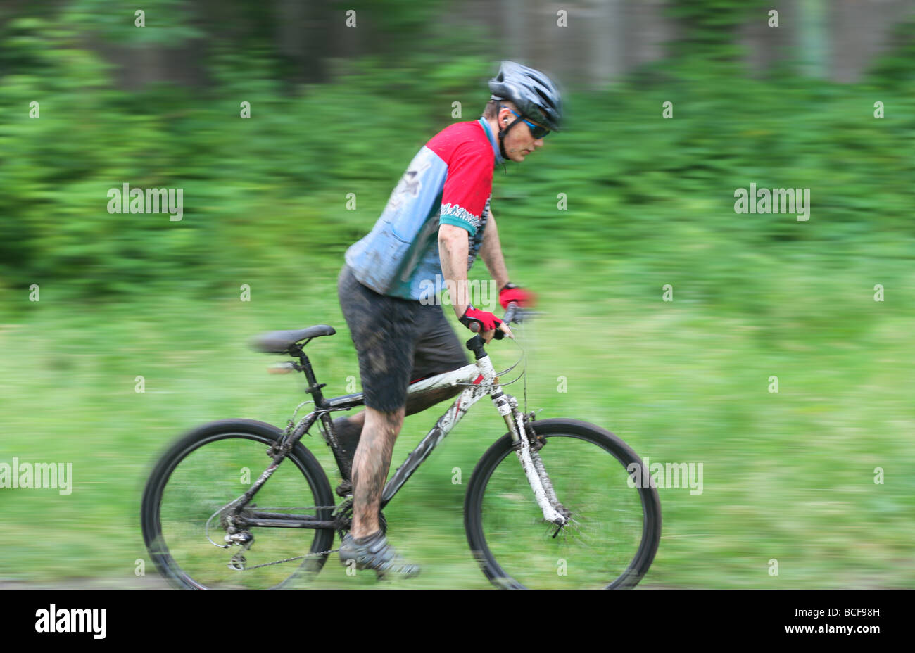 mountain bike racer Stock Photo - Alamy