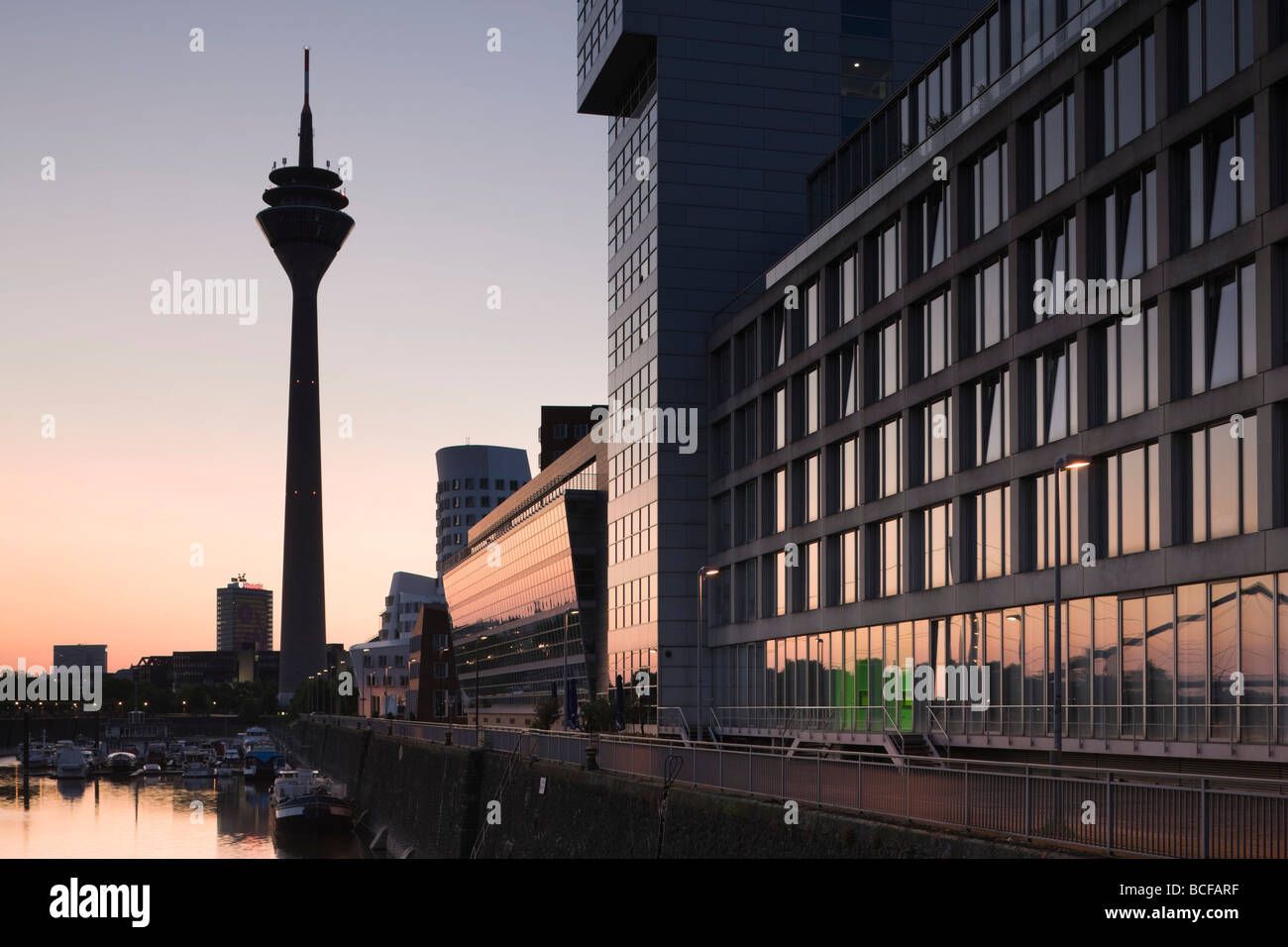 Germany, Rhineland-Westphalia, Dusseldorf, Medienhafen and Rhein Tower ...