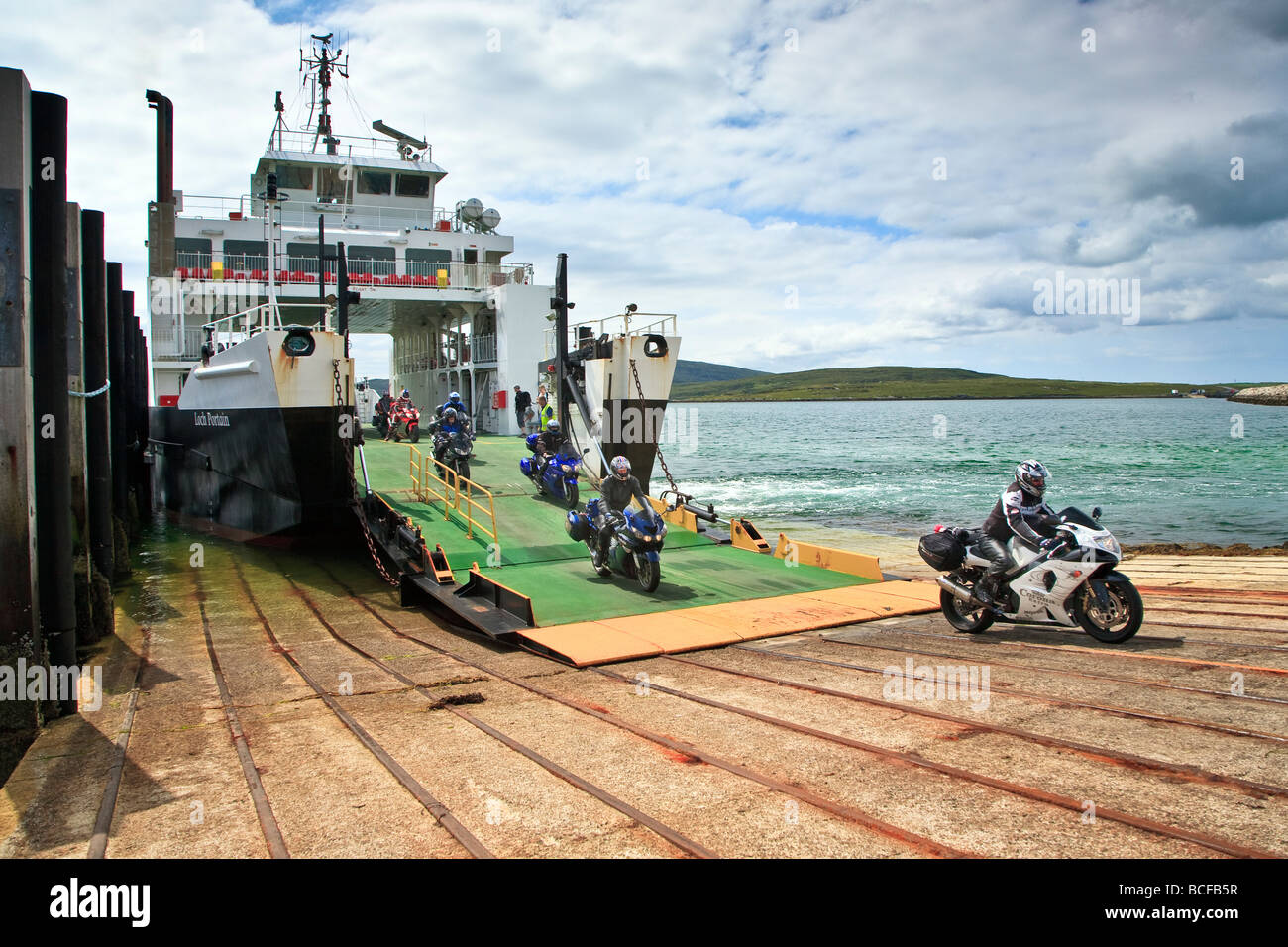 Motorbikers disembarking the ferry at Berneray Isle of Uist, Outer ...