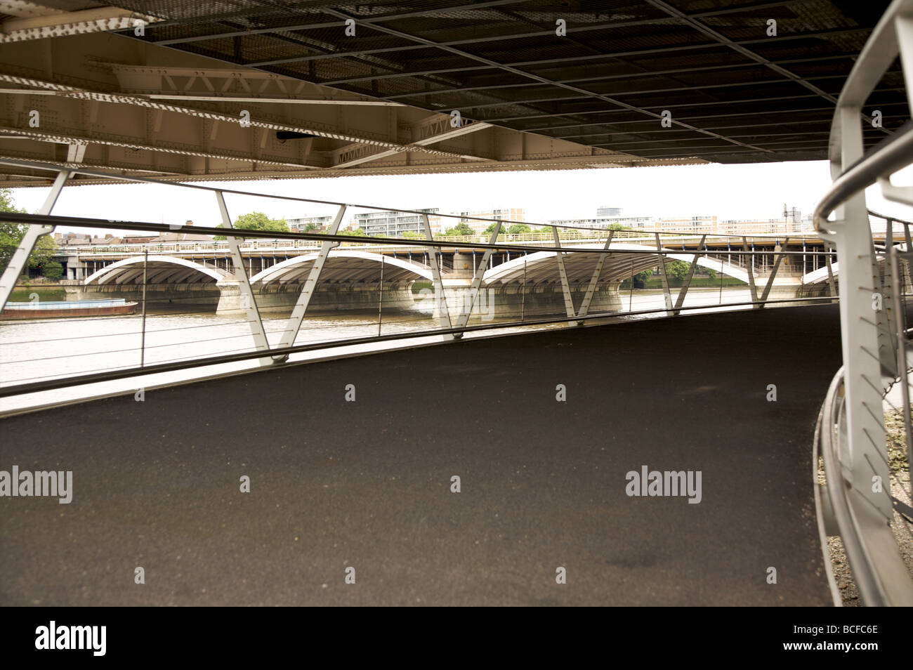 A new bridge curves under queenstown road as it passes over the Thames ...
