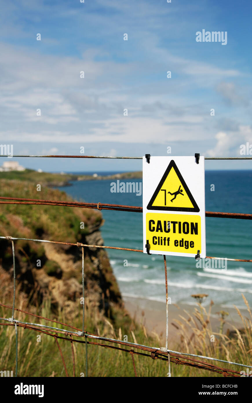 a warning sign above the cliffs at newquay in cornwall,uk Stock Photo ...