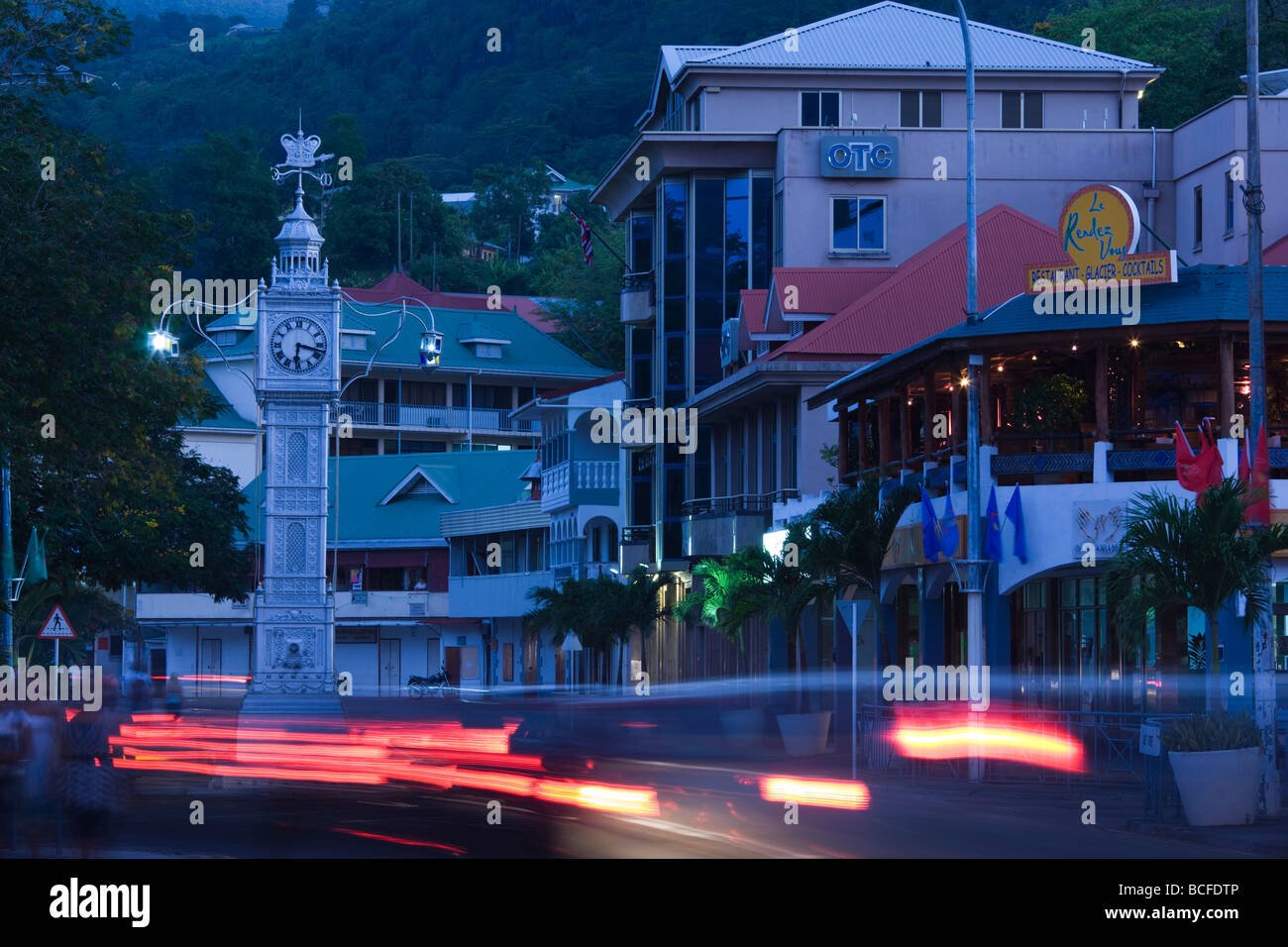 Seychelles, Mahe Island, Victoria, town clocktower and evening traffic ...