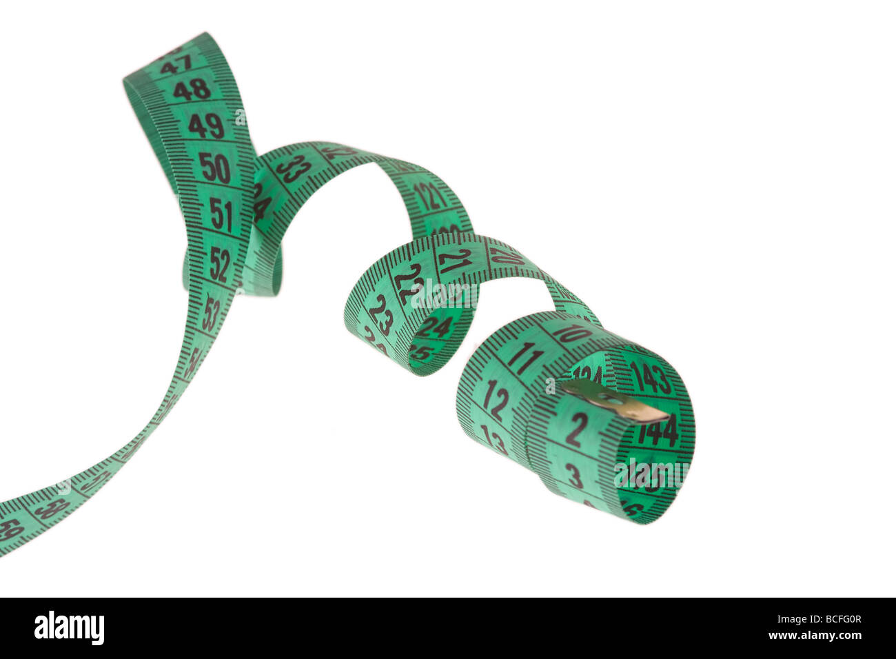 green measuring tape on white background Stock Photo - Alamy