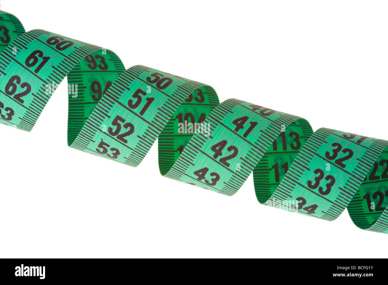 green measuring tape on white background Stock Photo - Alamy