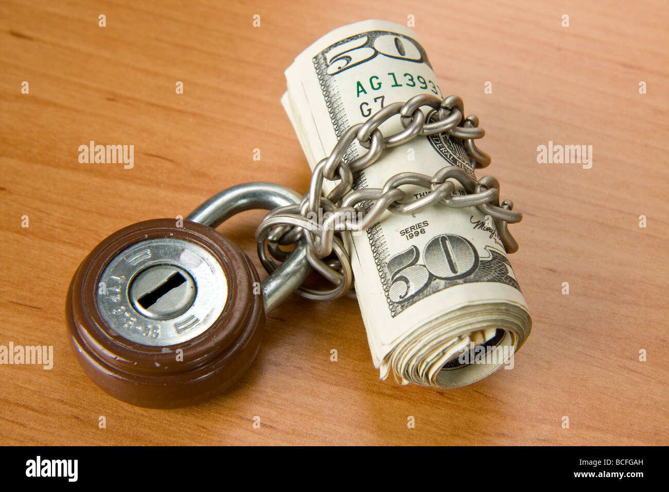 Money locked hi-res stock photography and images - Alamy