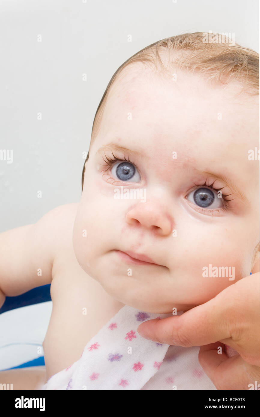 Baby Being Cleaned High Resolution Stock Photography and Images - Alamy