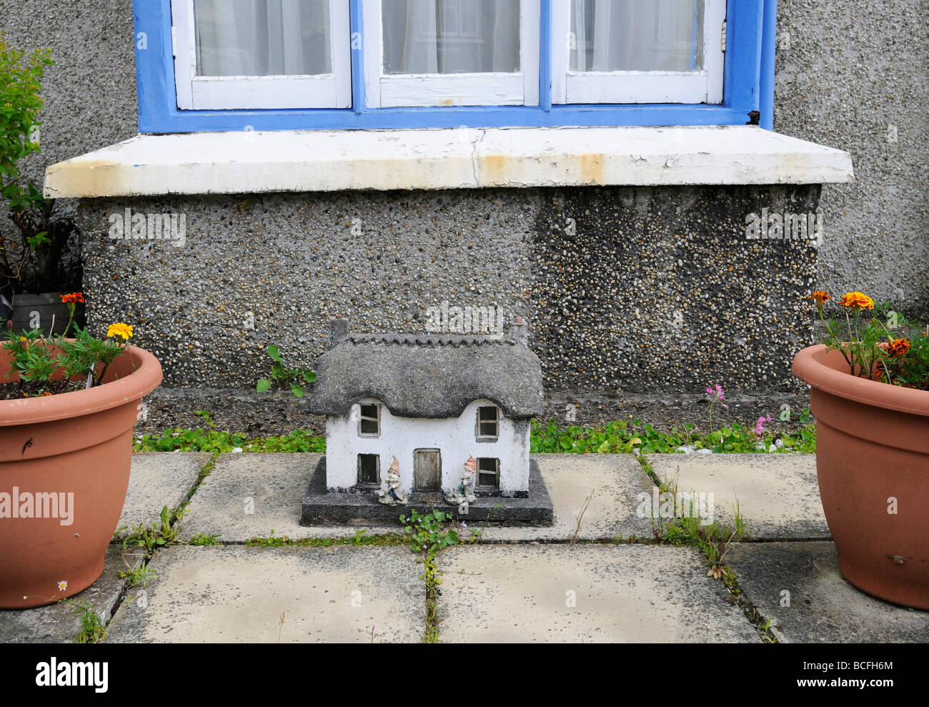A model house in a front garden Stock Photo - Alamy