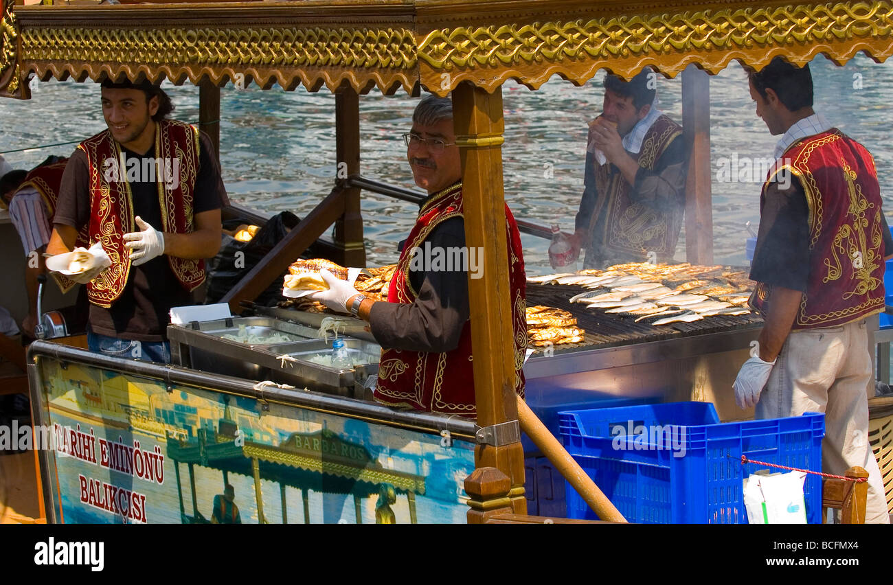 Traditional fish sandwich makers on boat in Istanbul Stock Photo - Alamy