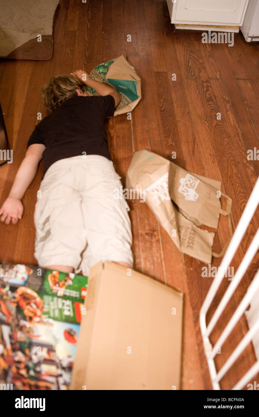 Kid passed out hi-res stock photography and images - Alamy