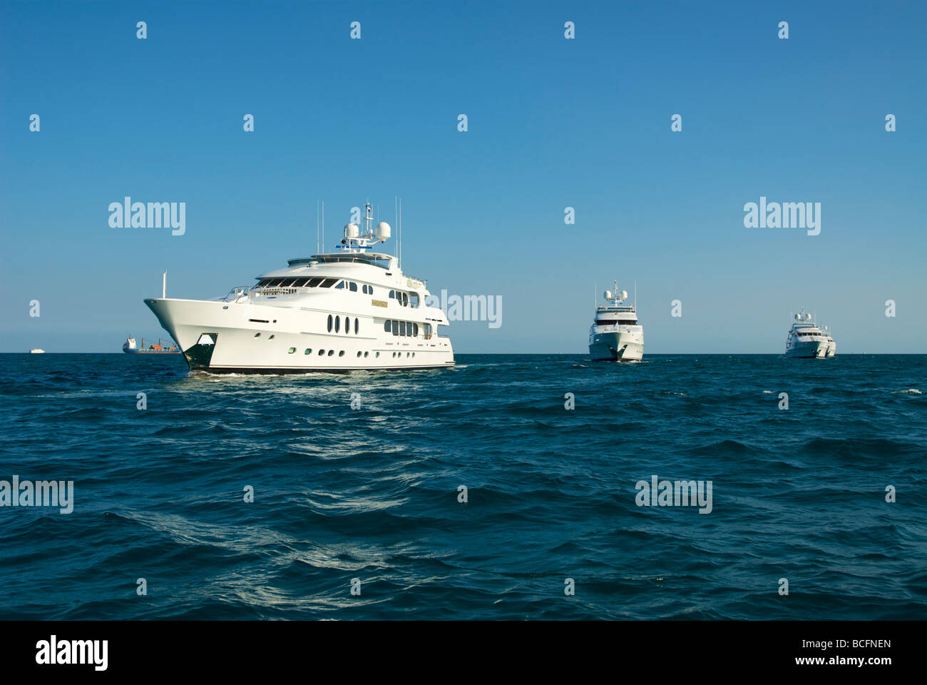 Large luxury yachts cruising in formation off the Florida coast Stock ...