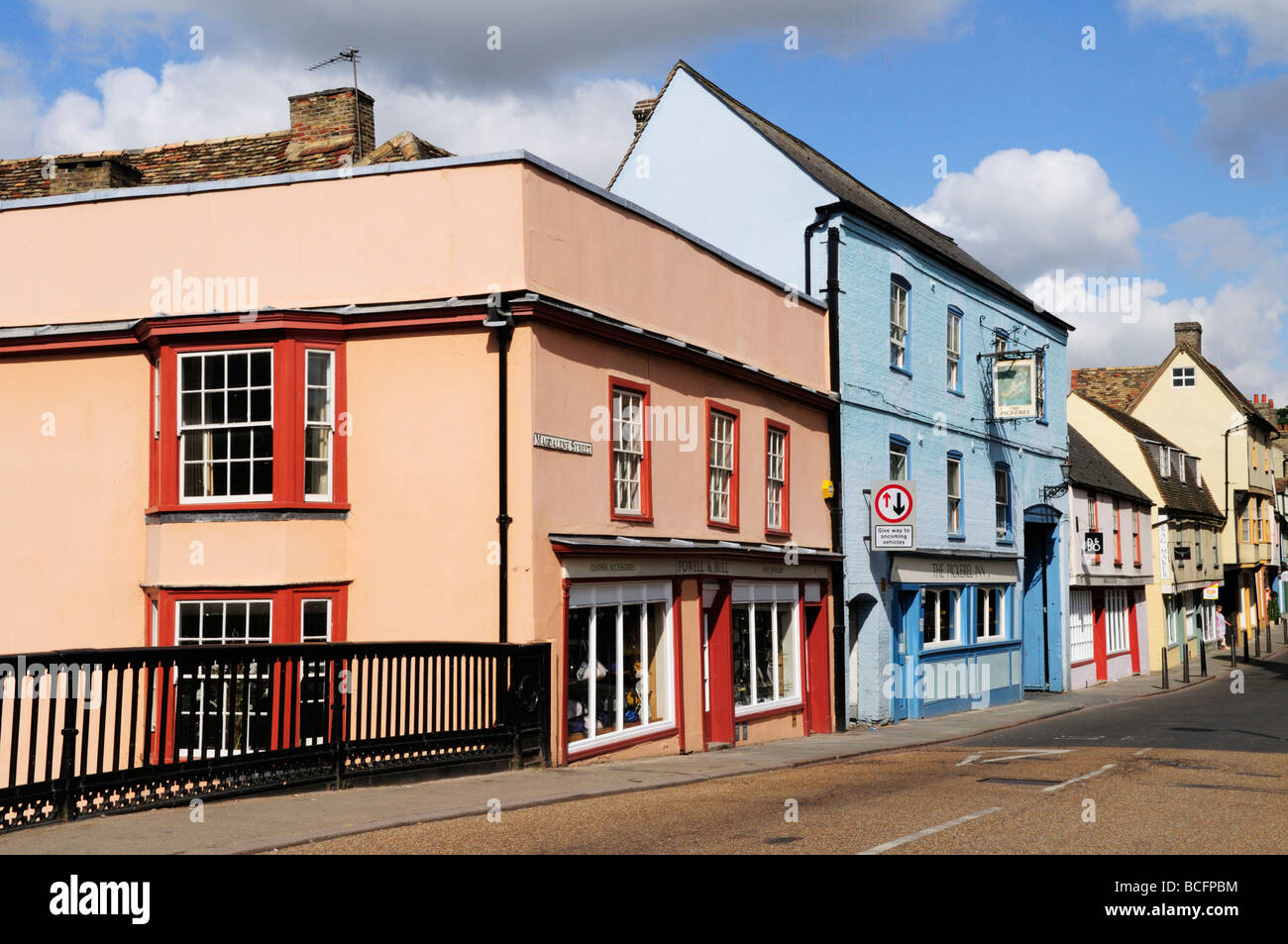 Colourful shops and The Pickerel Inn in Magdalene Street, Cambridge ...