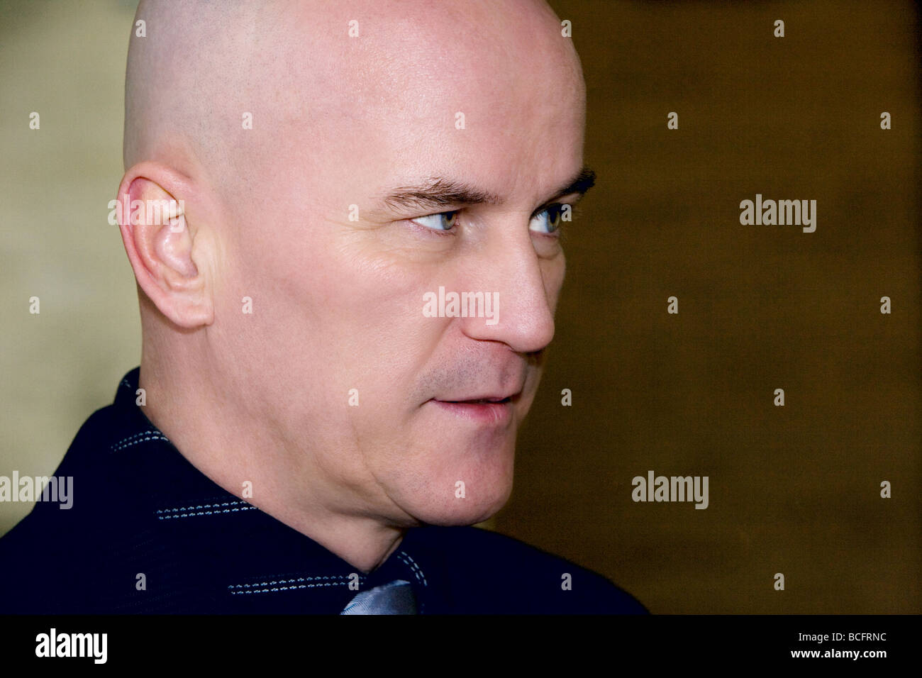 Black bald man head profile hi-res stock photography and images - Alamy