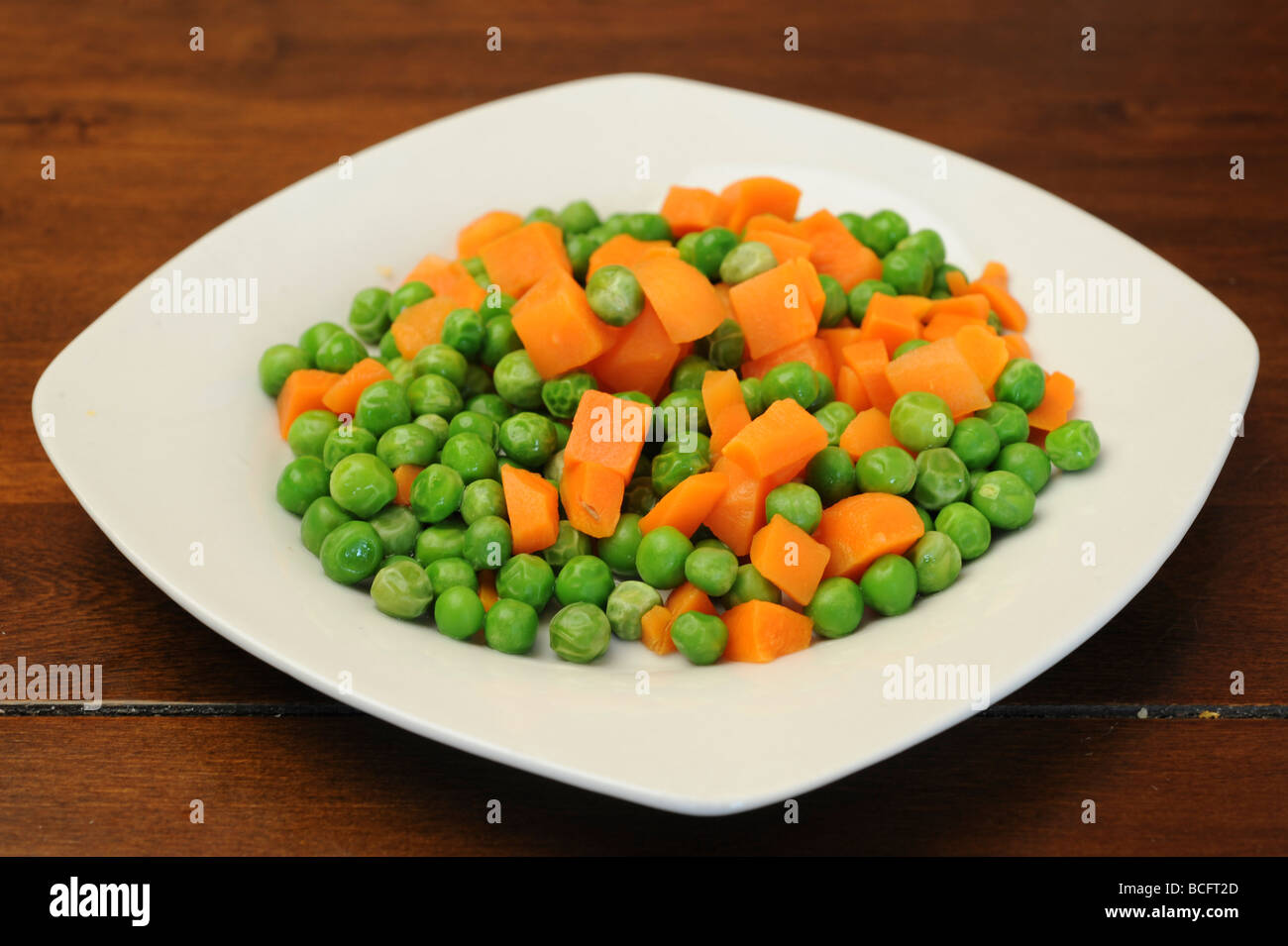 Steamed Peas and carrots salad Stock Photo - Alamy