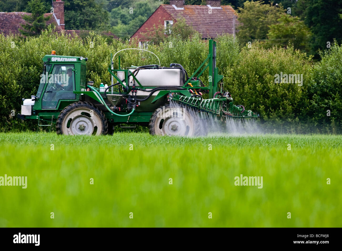 T2 Spraying of Spring Barley at Horne Court Farm Horley Surrey Stock ...