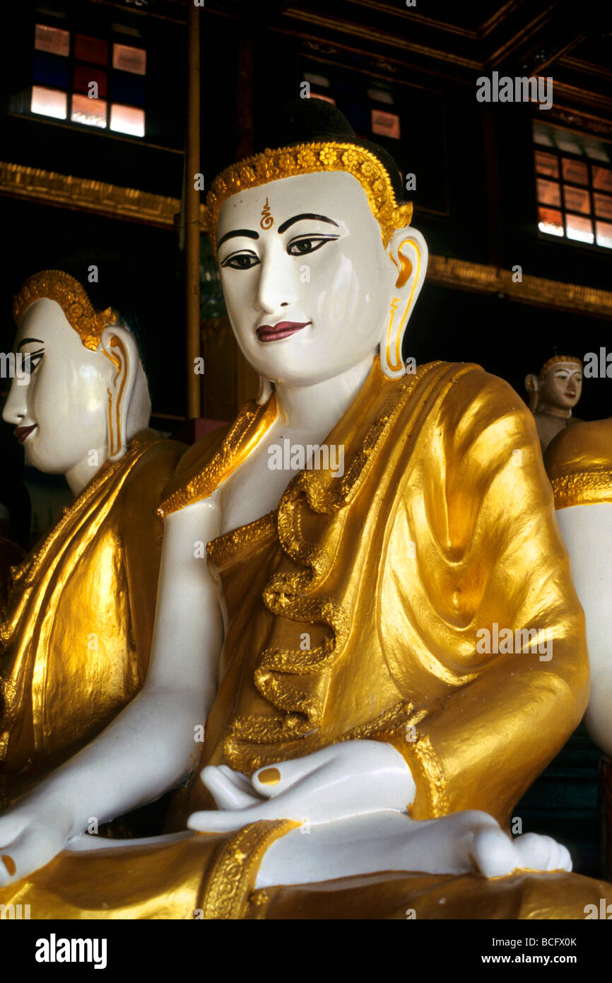 myanmar religious deities golden rock Stock Photo - Alamy