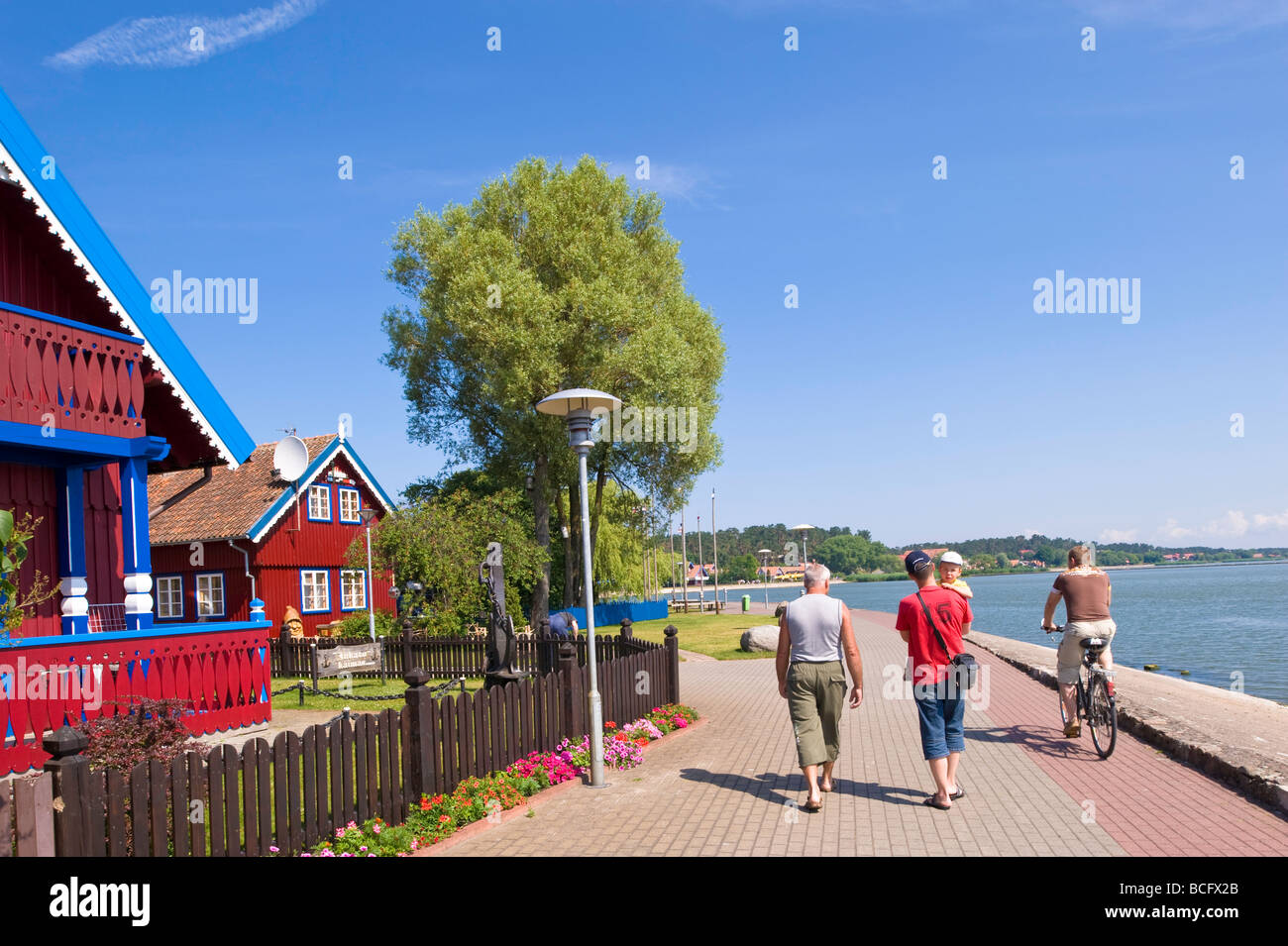 Typical wooden houses overlooking bay Nida village Neringa Lithuania ...
