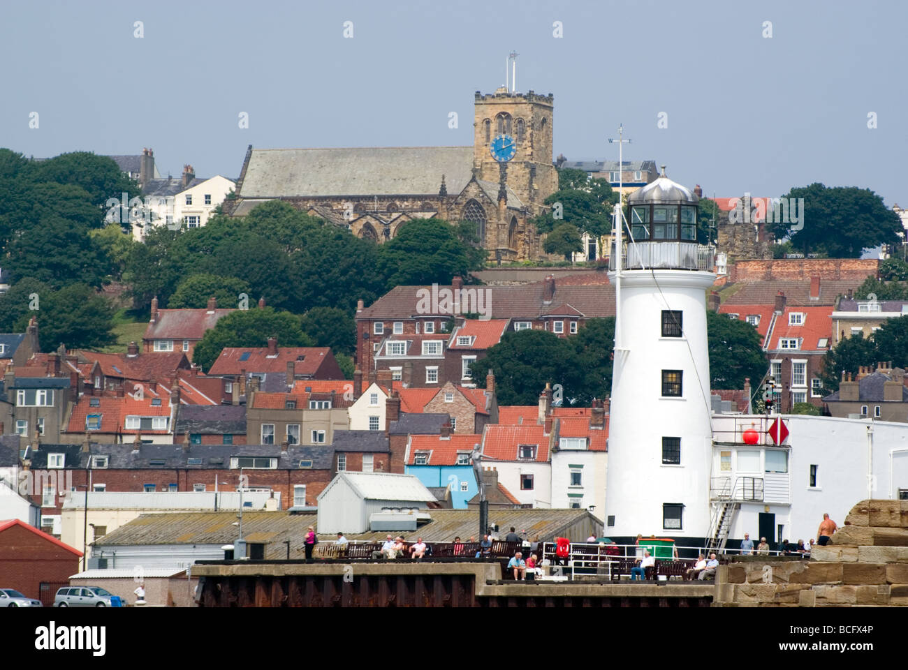 Scarborough lighthouse photographed from offshore Stock Photo - Alamy