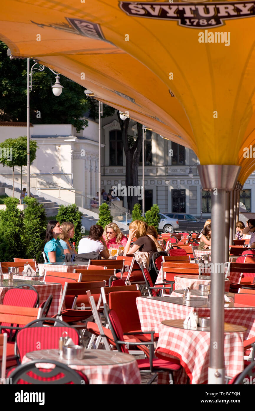 Sidewalk cafe bar busy with customers Vilnius Lithuania Stock Photo - Alamy