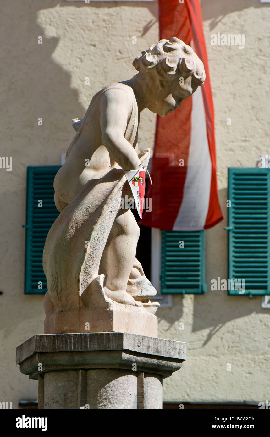 Stone statue boy fish hi-res stock photography and images - Alamy