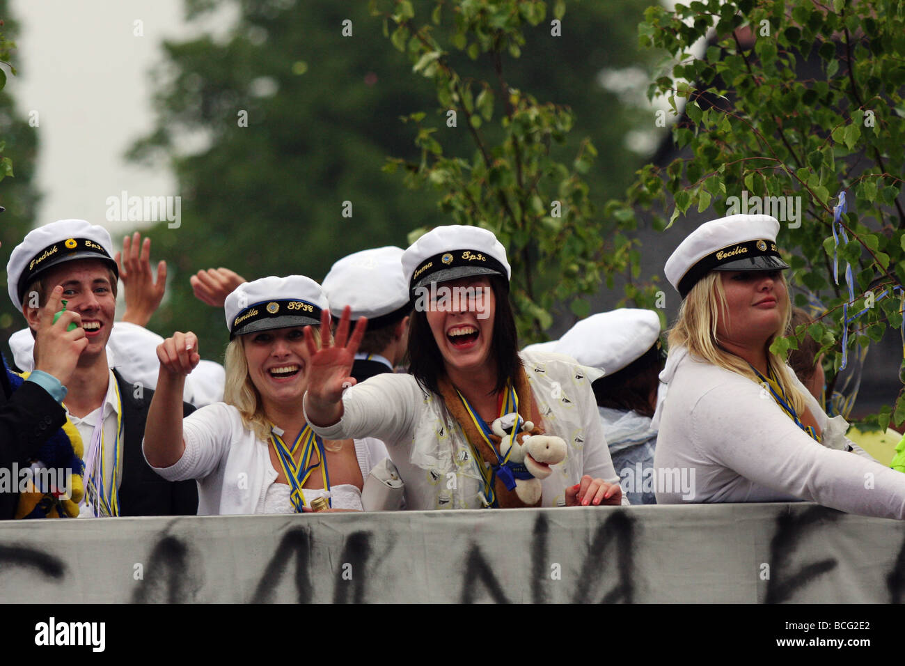 Swedish students, just graduated, being driven around town in big ...