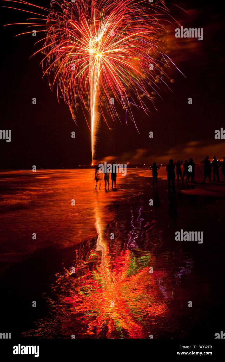 Fireworks explode along the beach at Isle of Palms SC marking ...
