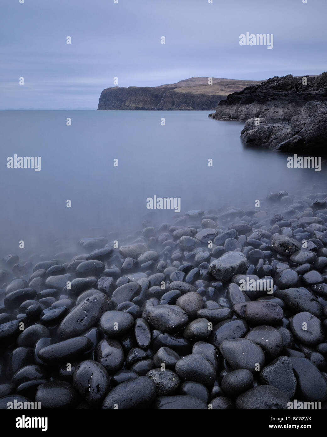 A long exposure has transformed the bay at Milovaig on Skye into a ...