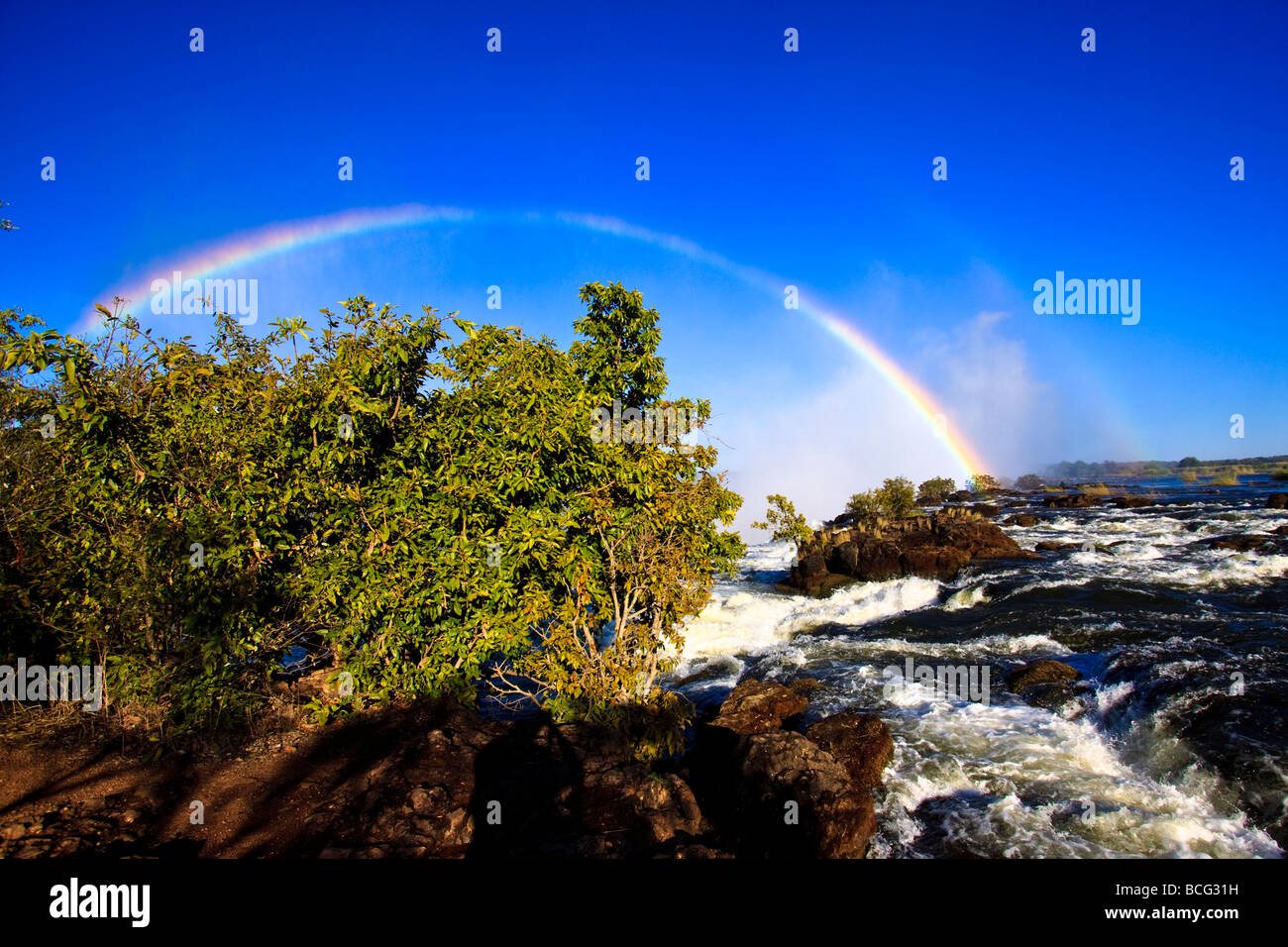 Rainbow over Victoria Falls, Zambia Stock Photo - Alamy