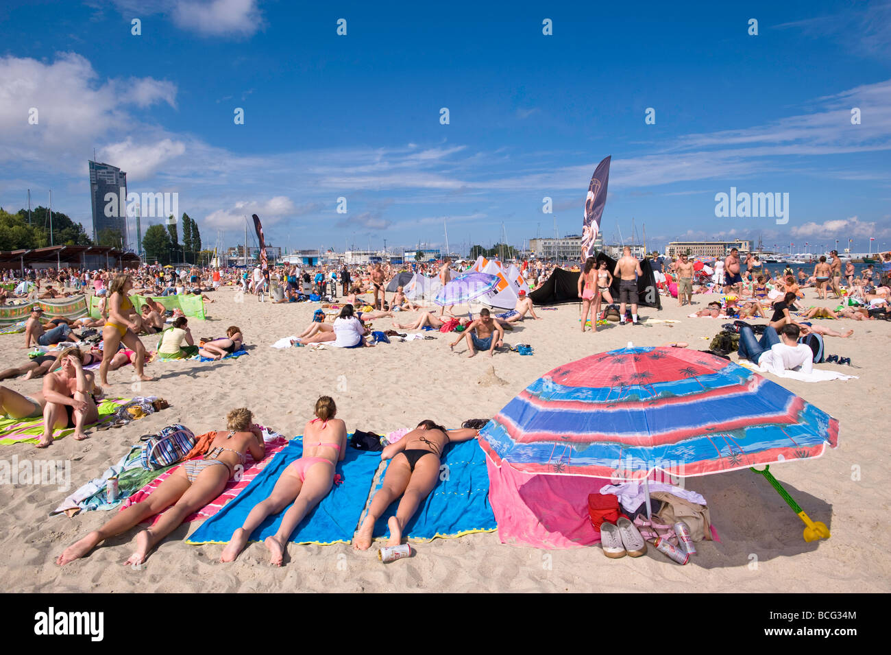 People sunbathing on sandy beach Baltic Sea Gdynia Poland Stock Photo - Alamy
