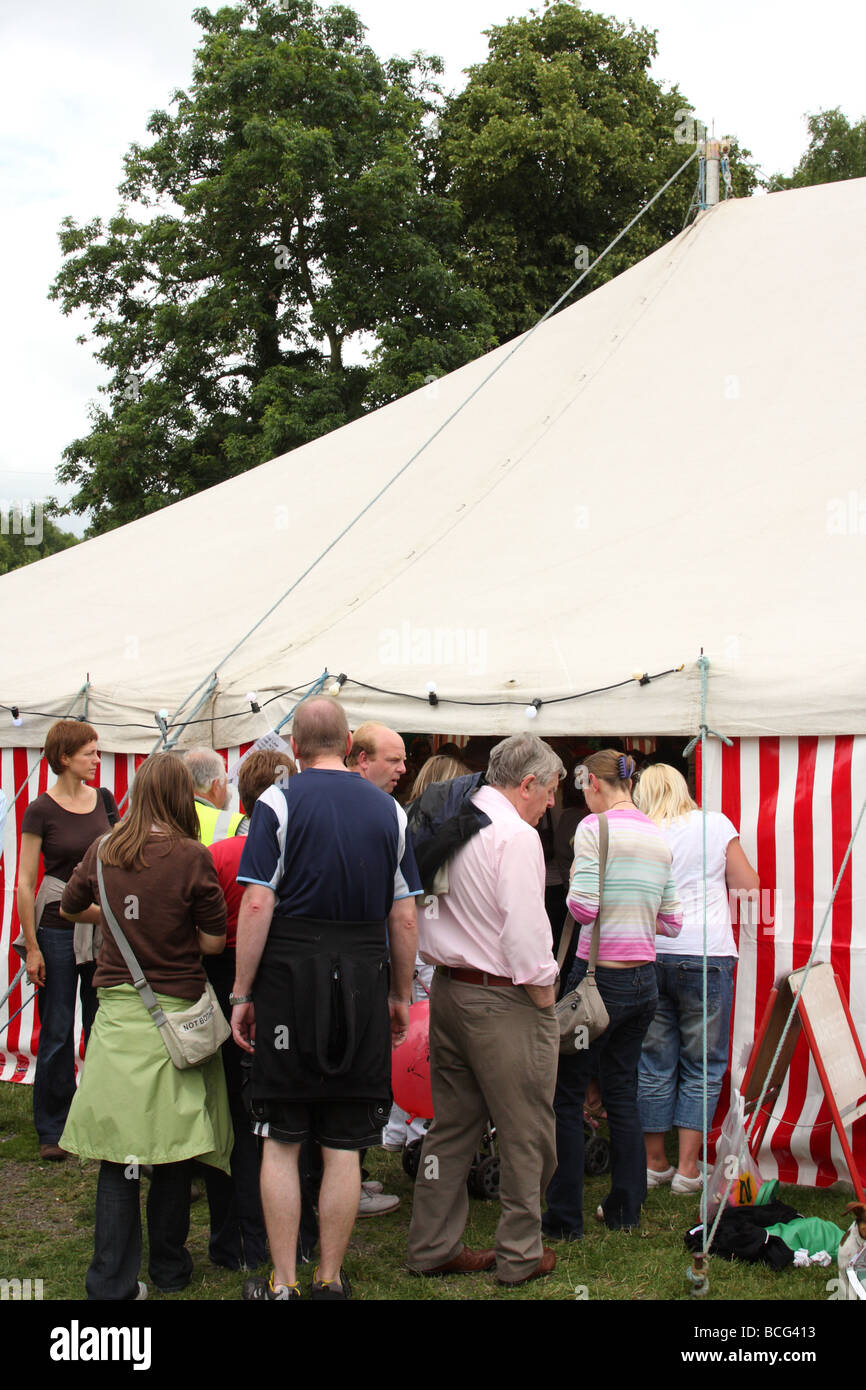 A queue at a beer tent at an English village show Stock Photo - Alamy