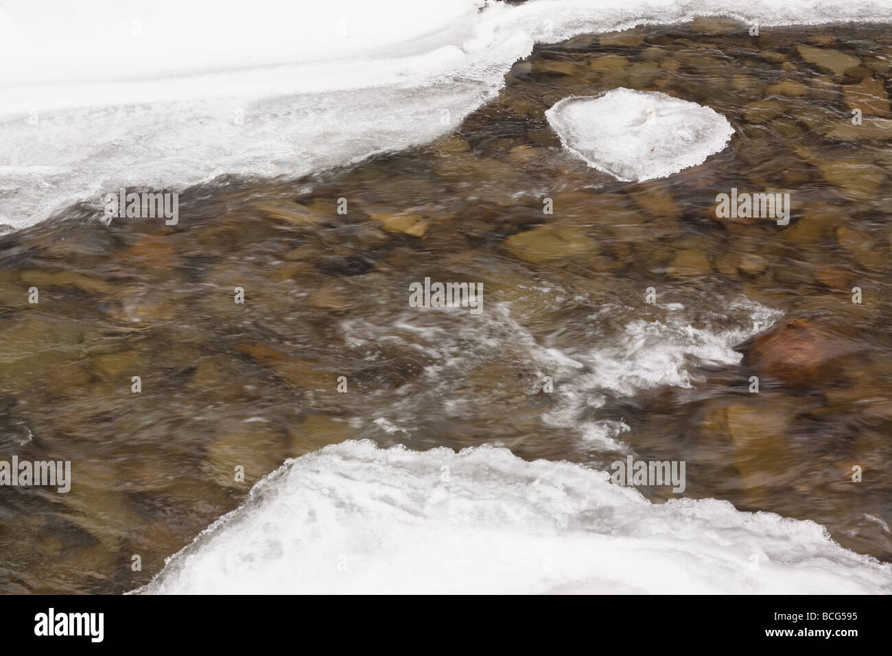 Creek at spring thaw Stock Photo - Alamy