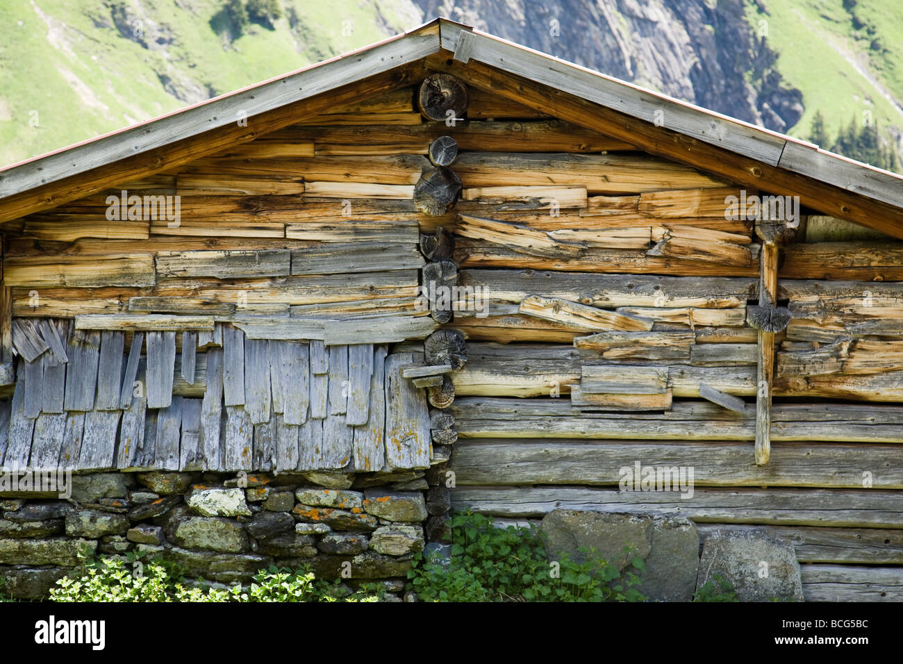 A wooden barn in the alps above Grindelwald, Switzerland Stock Photo ...