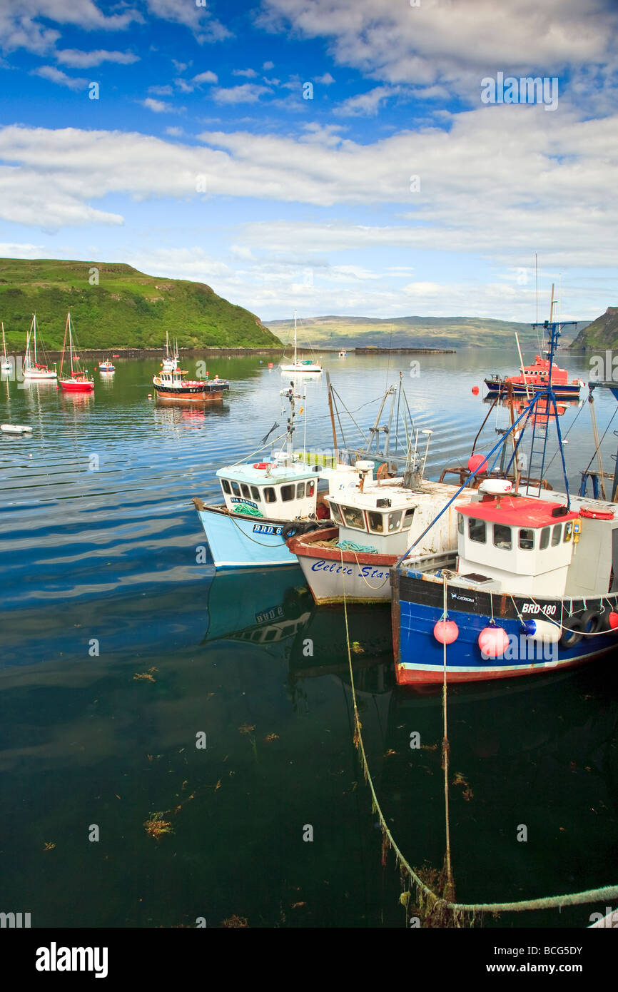 Fishing boats moored in the harbour at Portree, Isle of Skye, Scotland ...