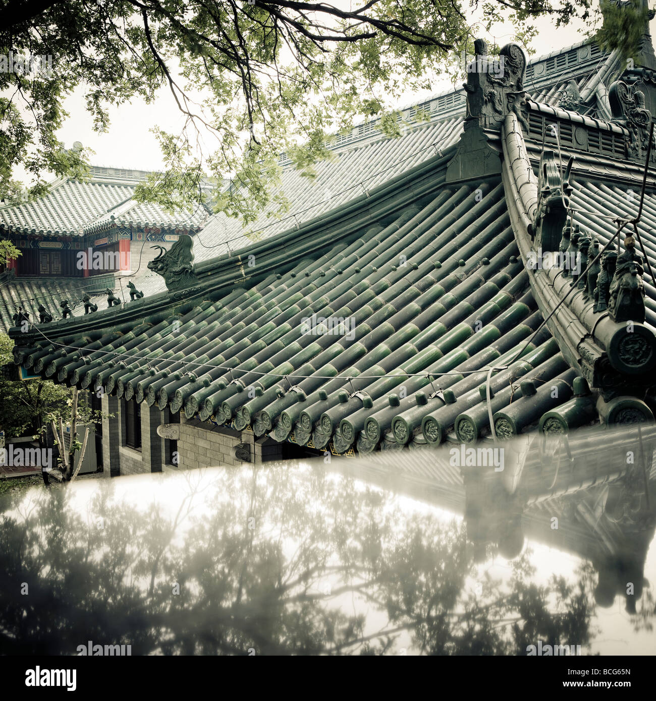 Green ceramic tiled roof of an ancient building in Bejing China Stock ...