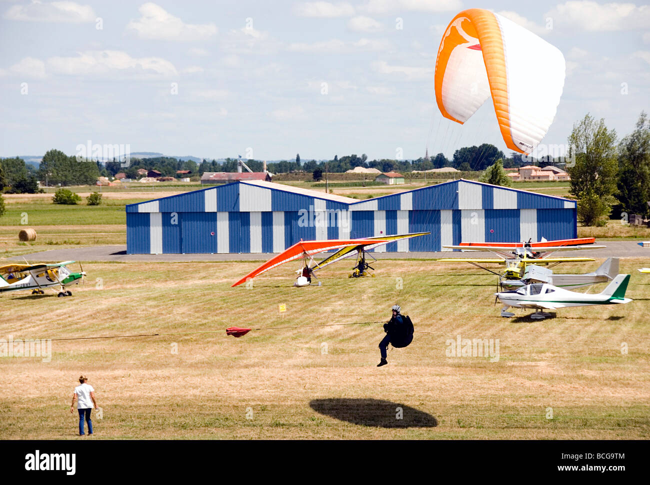 Paraglider taking off at an airshow in France Stock Photo - Alamy