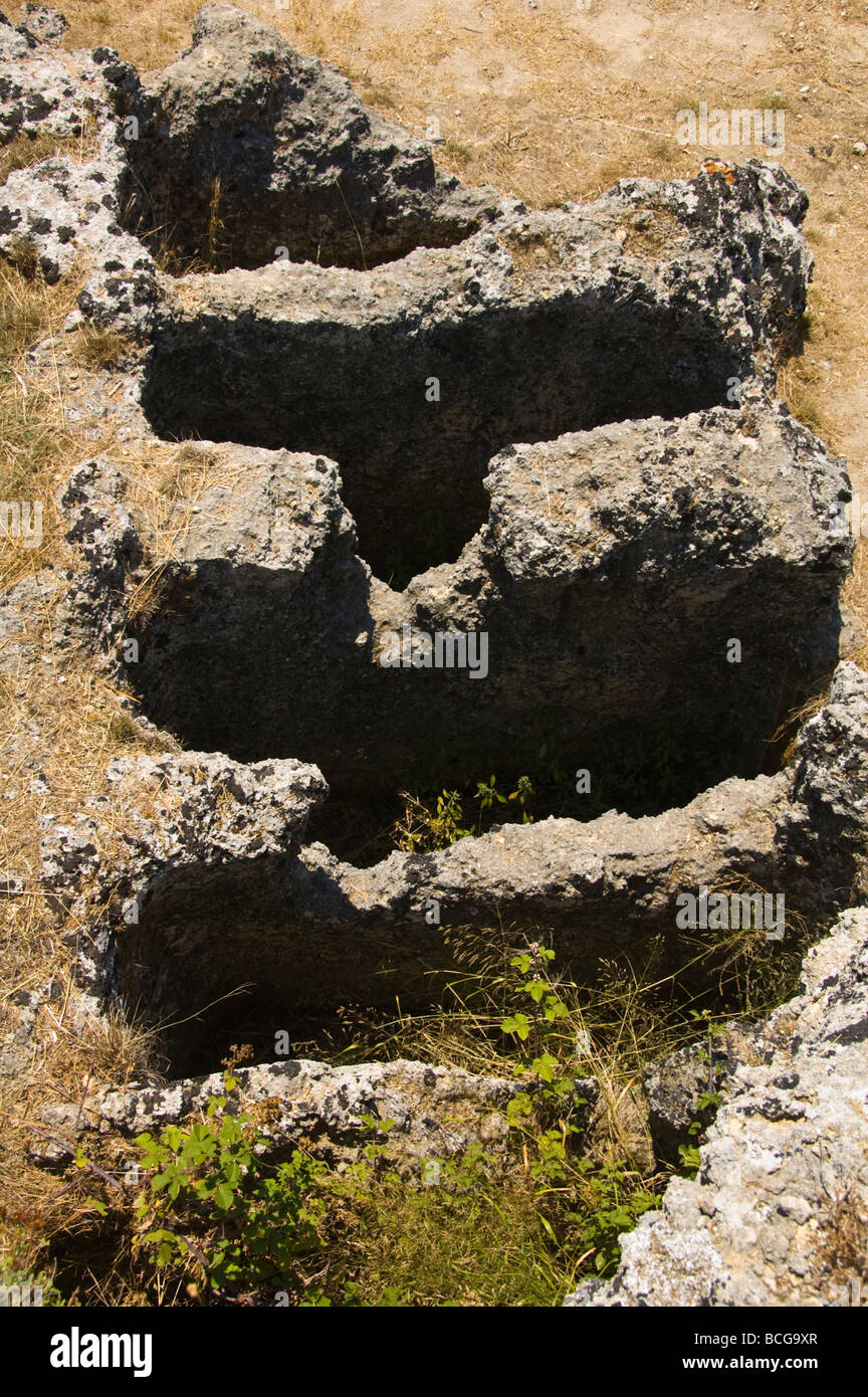 Graves in Mycenaean Cemetery carved from solid rock around 1500BC at ...